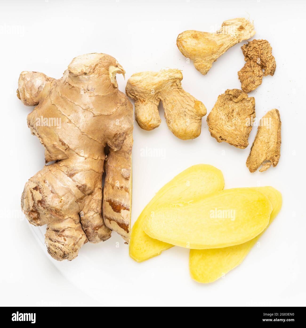 top view of sliced and dried ginger roots on gray plate close up Stock ...