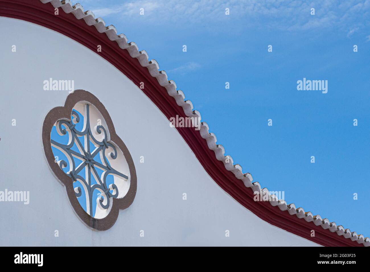 Architectural detail close-up of swooping line rooftop with crenelated ...