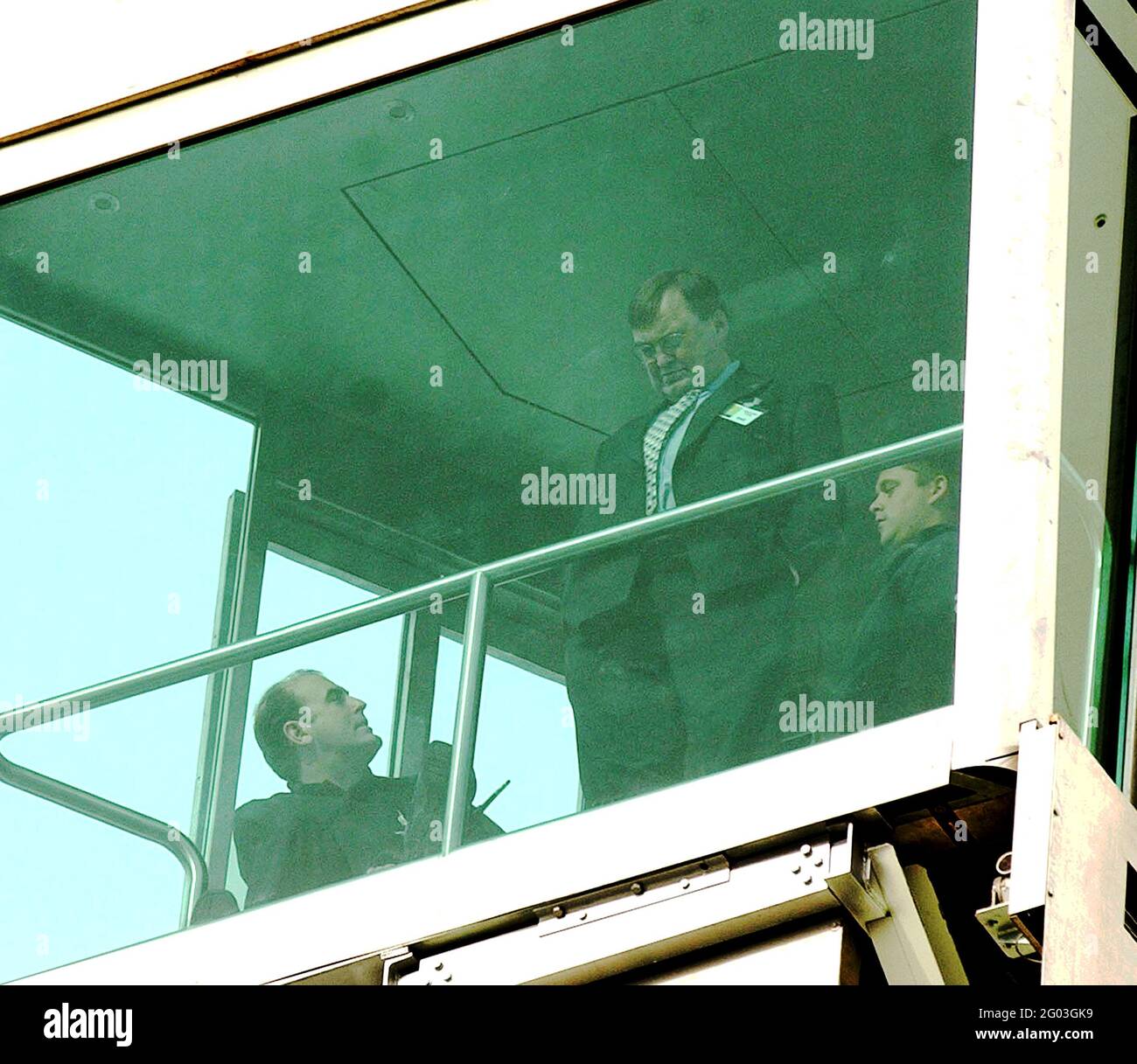 SPINNAKER TOWER LIFT, THE LIFT MOTIONLESS WITH THREE MEN IN IT AT THE ...