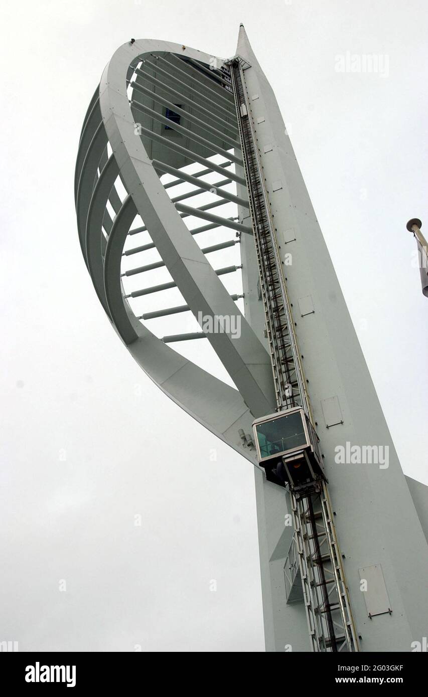SPINNAKER TOWER LIFT, THE LIFT MOTIONLESS WITH THREE MEN IN IT AT THE ...