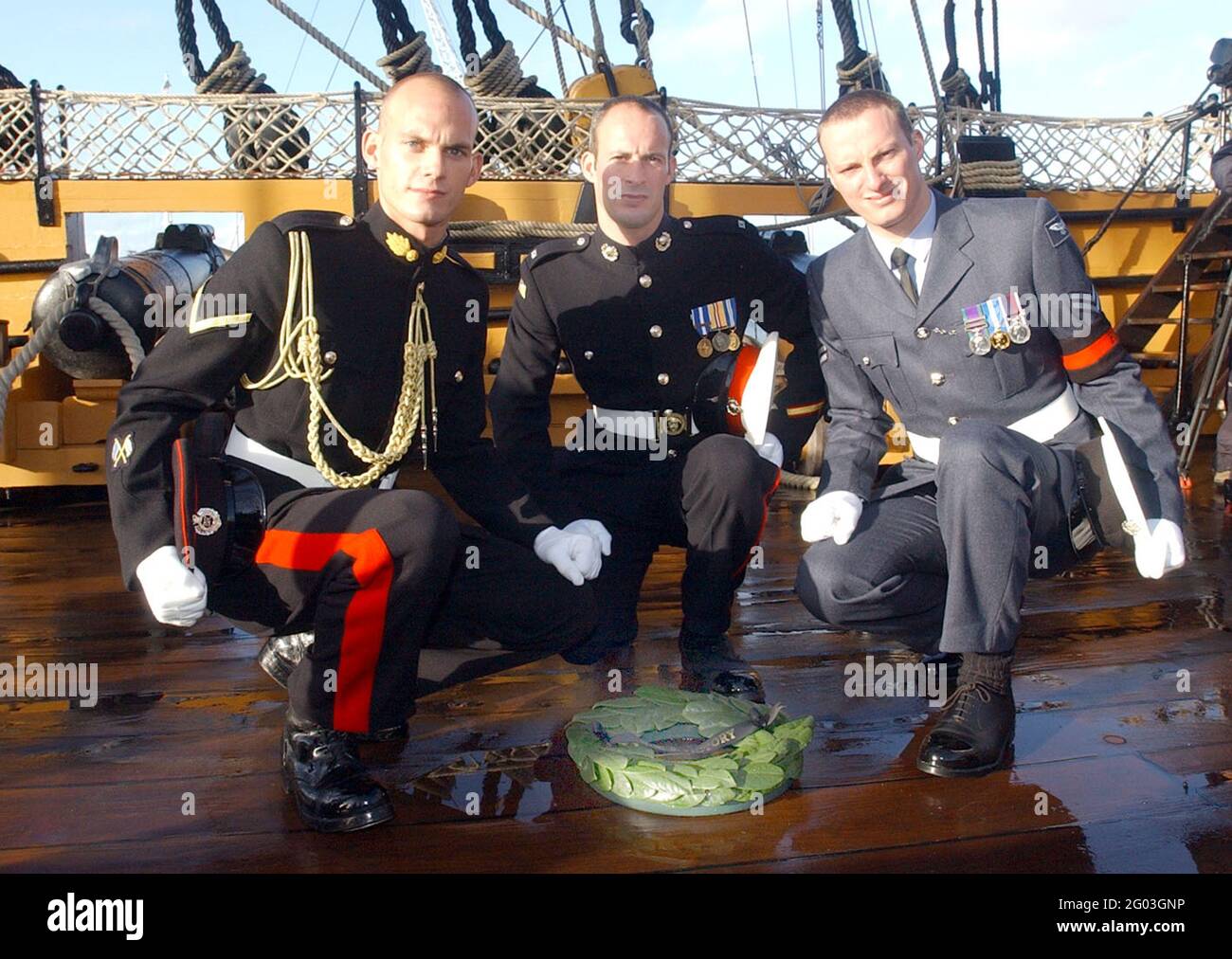 DESCENDENTS OF NELSON ABOARD HMS VICTORY WITH THE WREATH LAID TO MARK ...