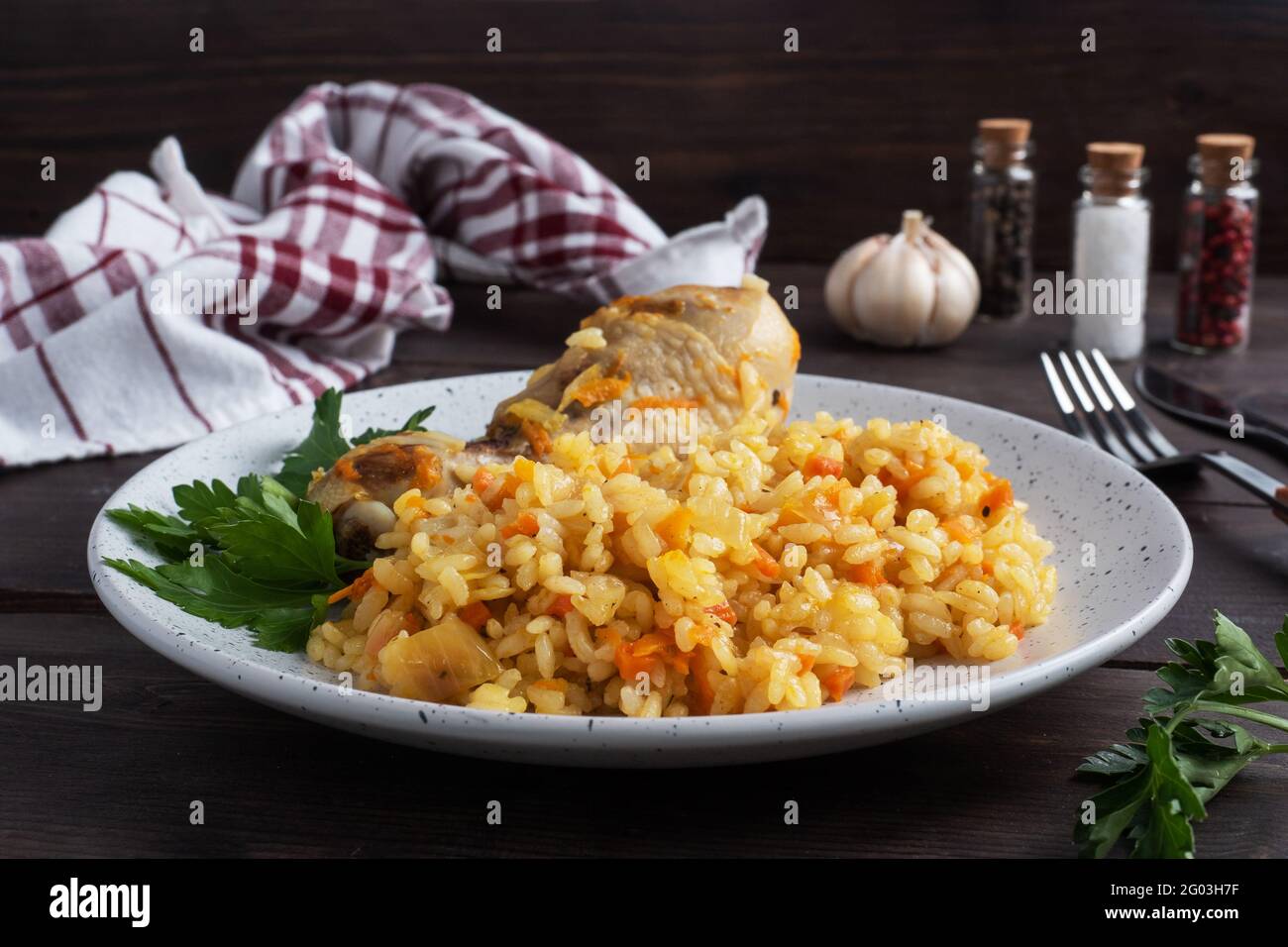 Delicious Asian pilaf, stewed rice with vegetables and chicken ...