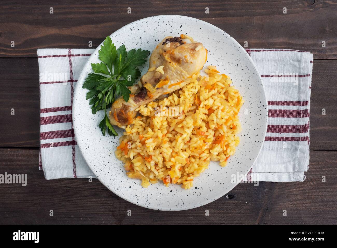 Delicious Asian pilaf, stewed rice with vegetables and chicken ...