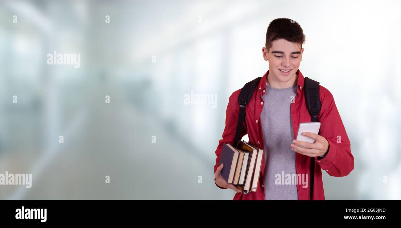 teenage student with mobile phone at school Stock Photo - Alamy