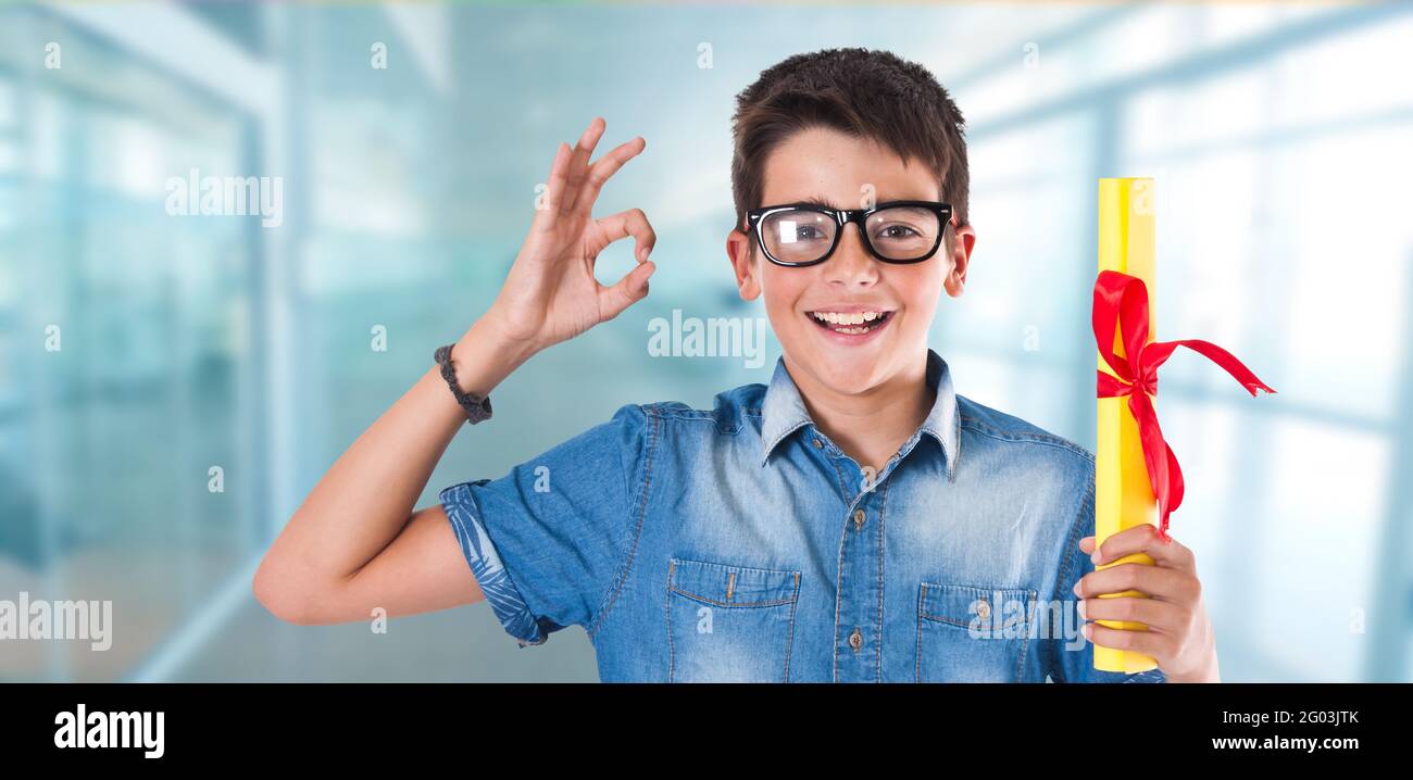 little boy at school with diploma Stock Photo - Alamy