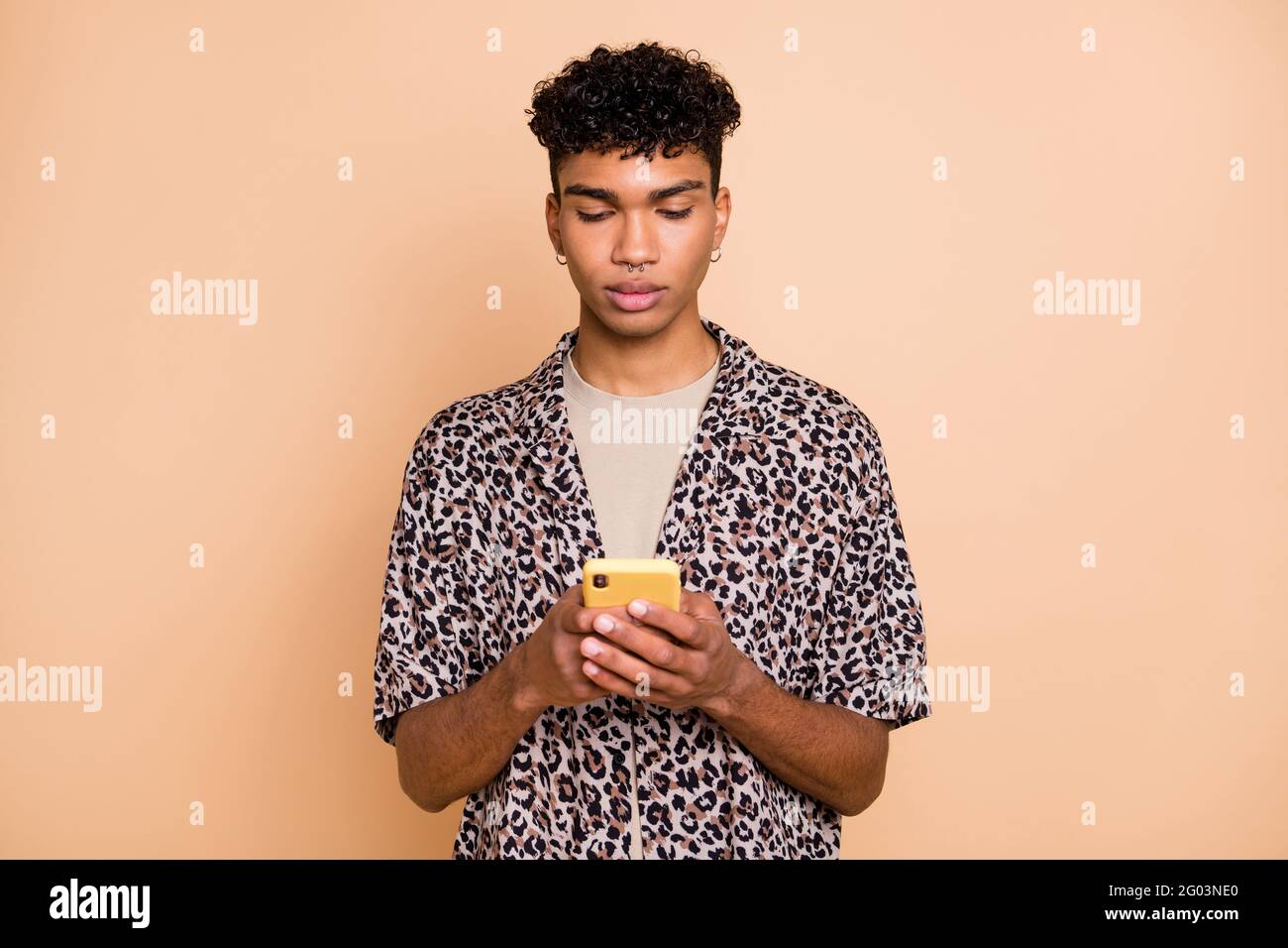 Photo of handsome dark skin person look screen concentrated face write ...