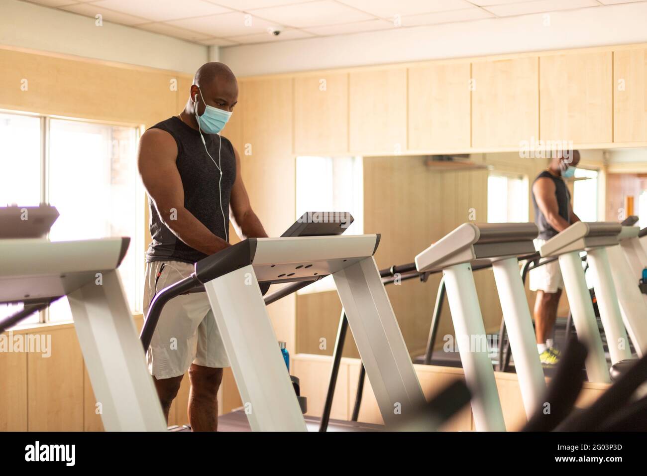 Young man treadmill mask hi-res stock photography and images - Alamy