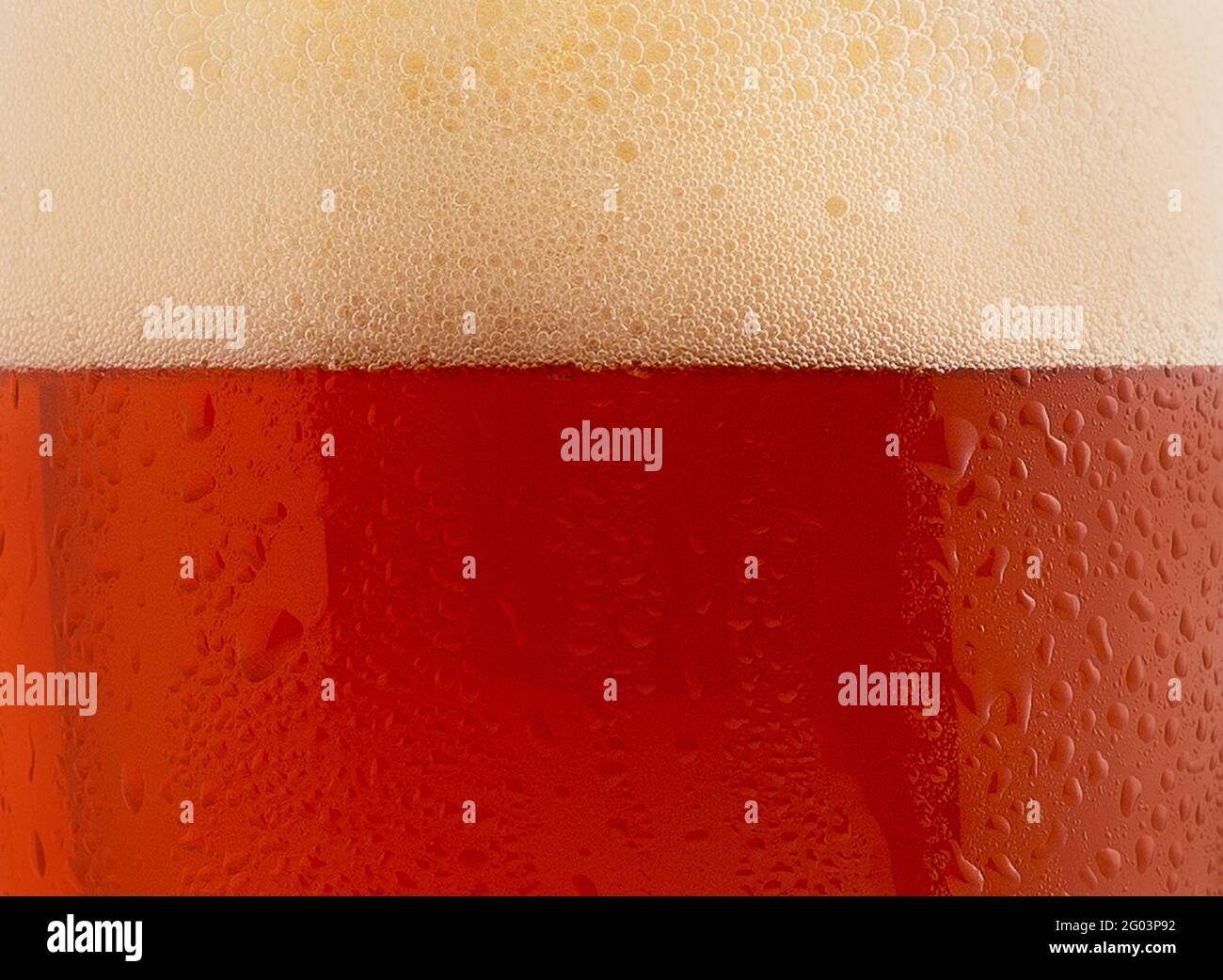 Beer background with bubble froth texture, pouring alcohol in glass ...