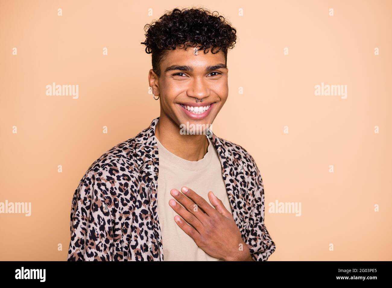 Portrait of brunet hooray guy hand chest wear modern shirt isolated on ...