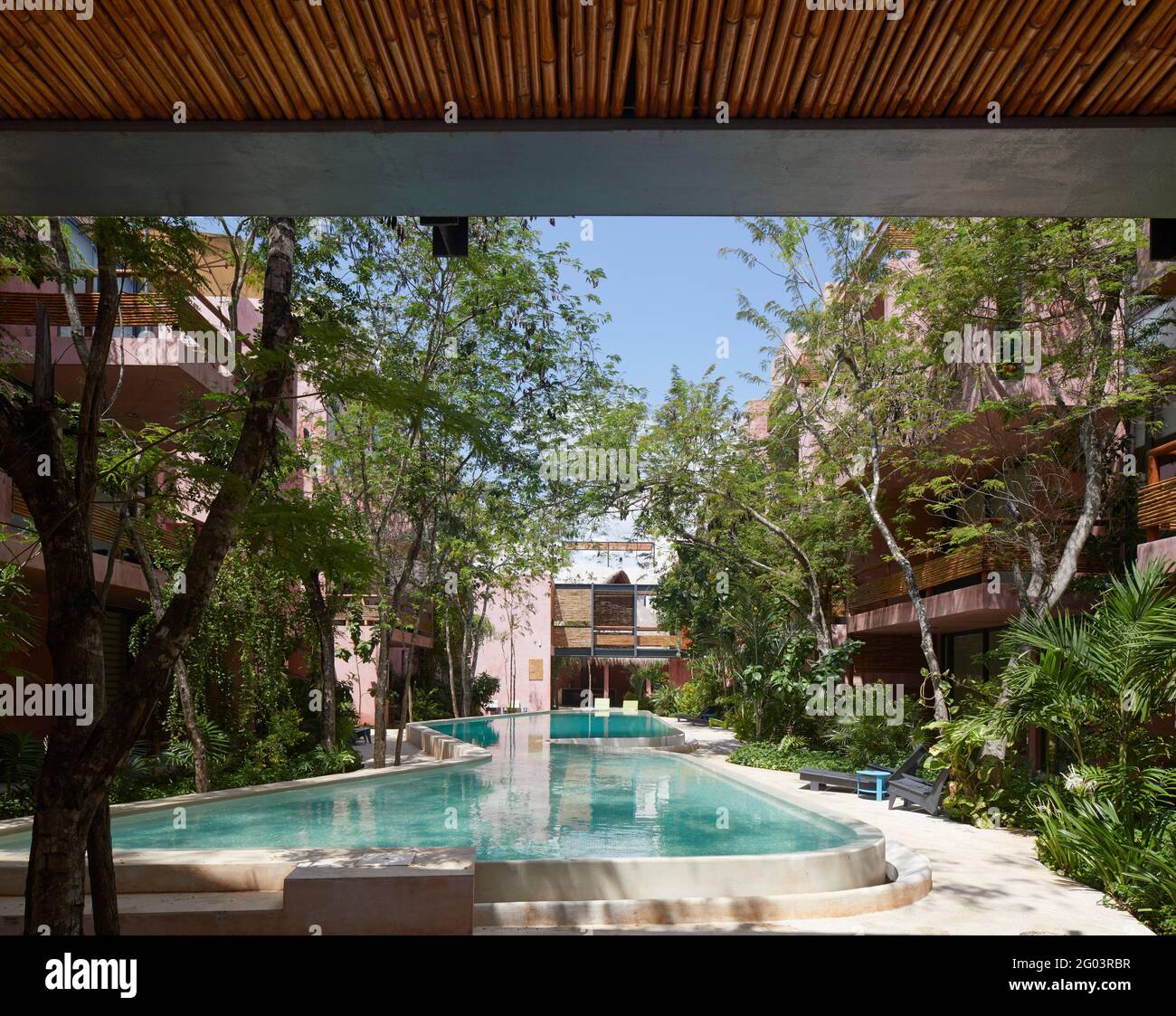 Communal area around pool. Tulum Apartments, Tulum, Mexico. Architect ...