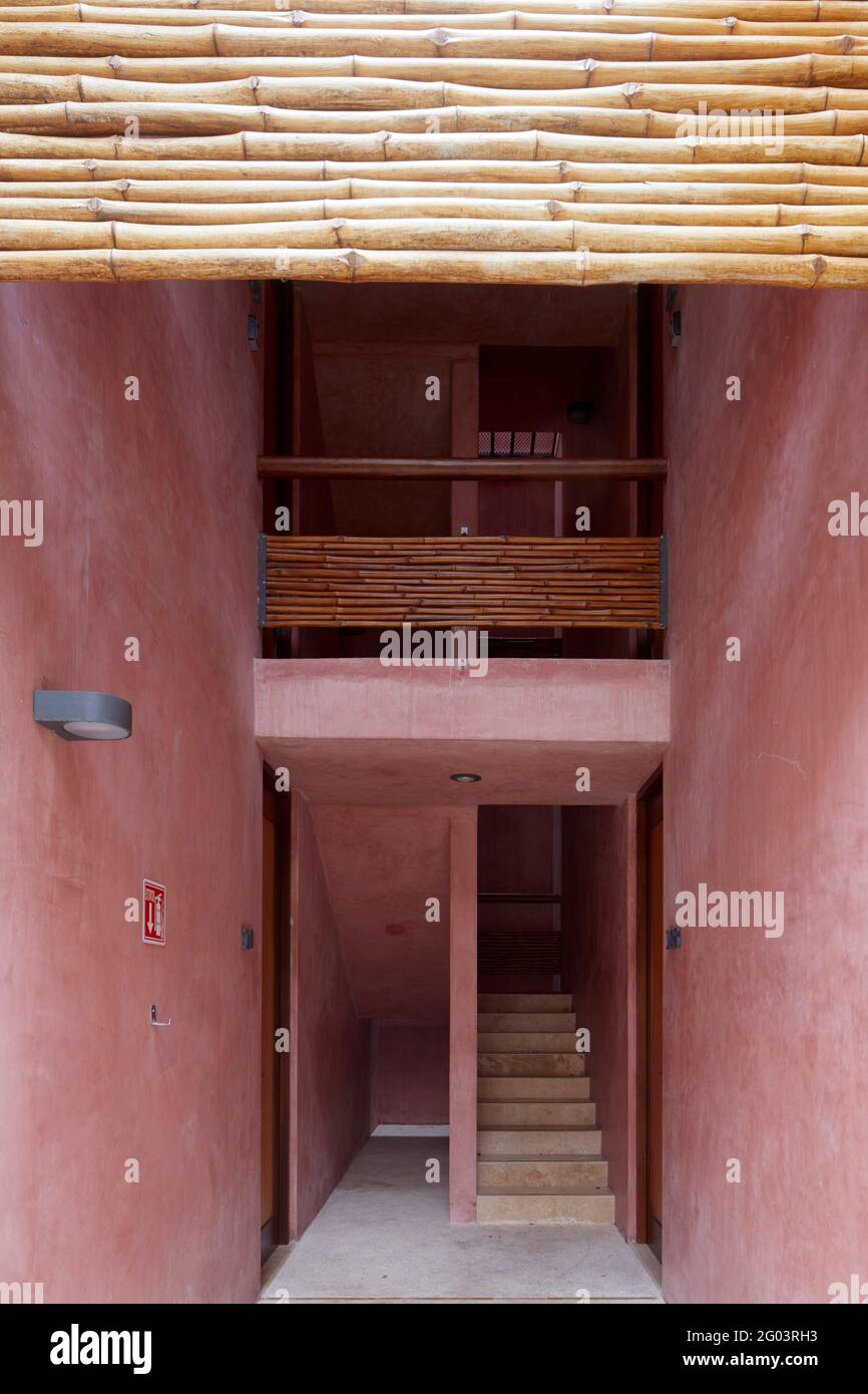 Public corridor and stairs. Tulum Apartments, Tulum, Mexico. Architect ...