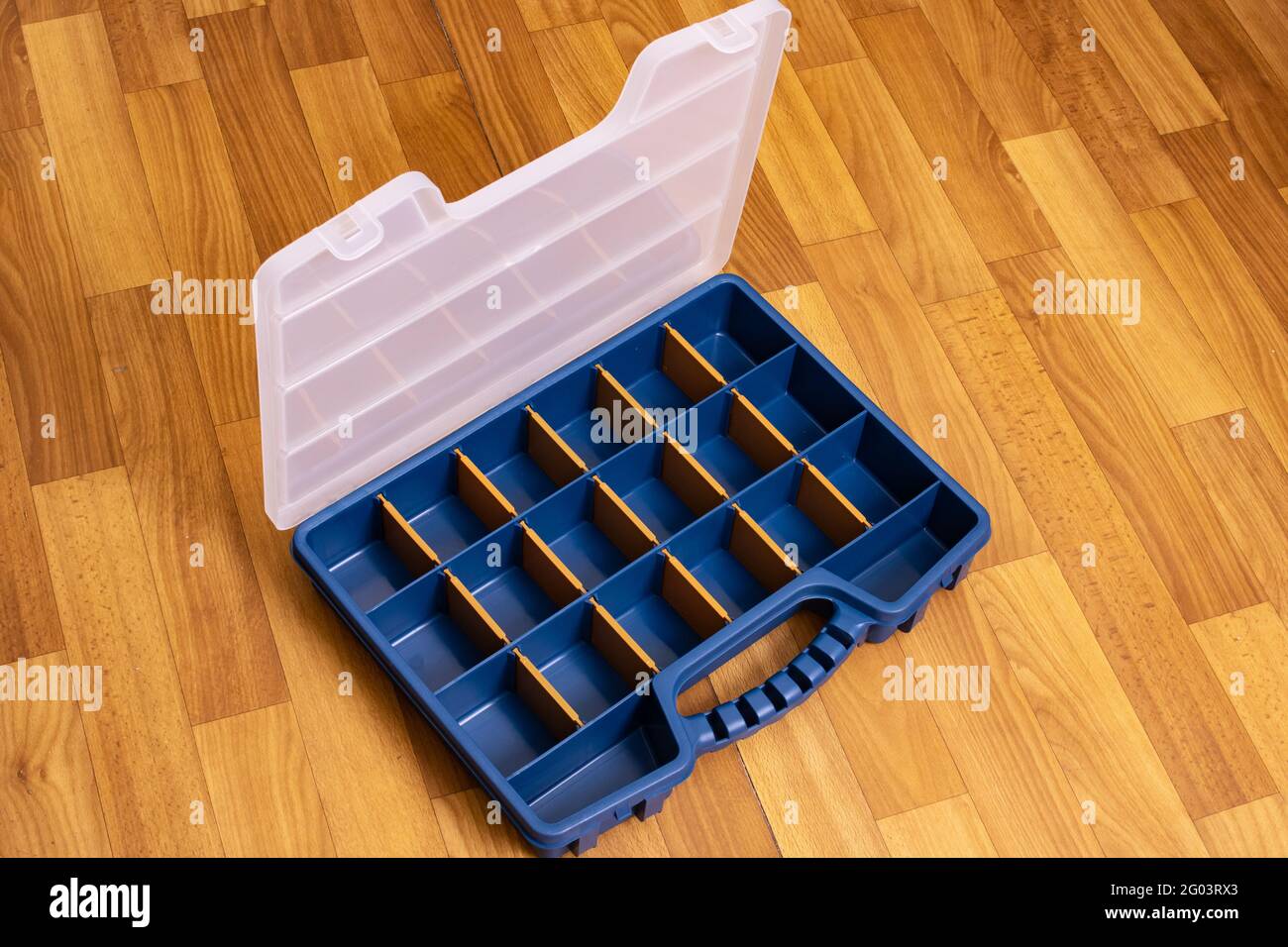 Plastic cells in the small change box close up Stock Photo - Alamy