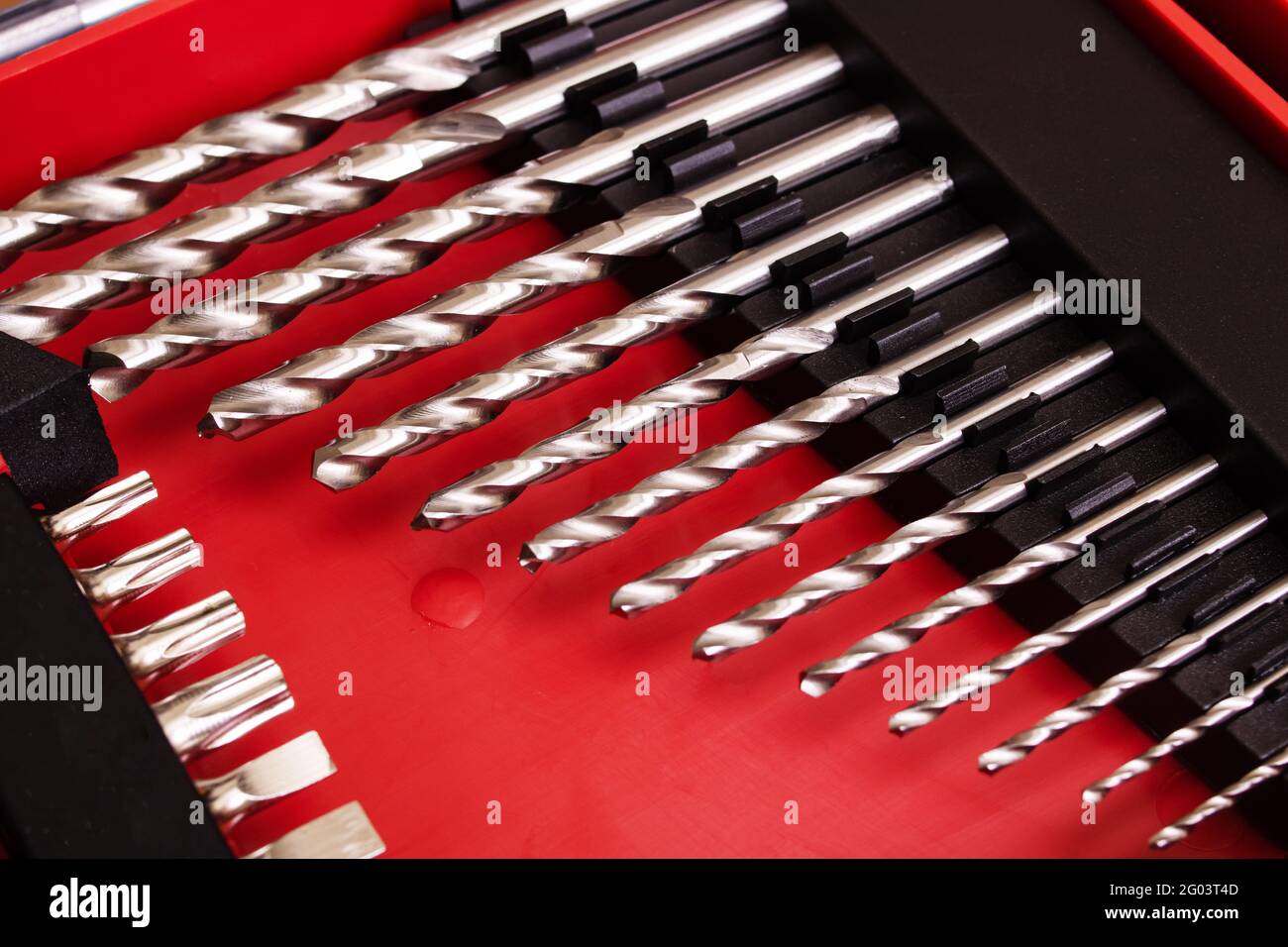 A set of different drills for a drill close up Stock Photo - Alamy