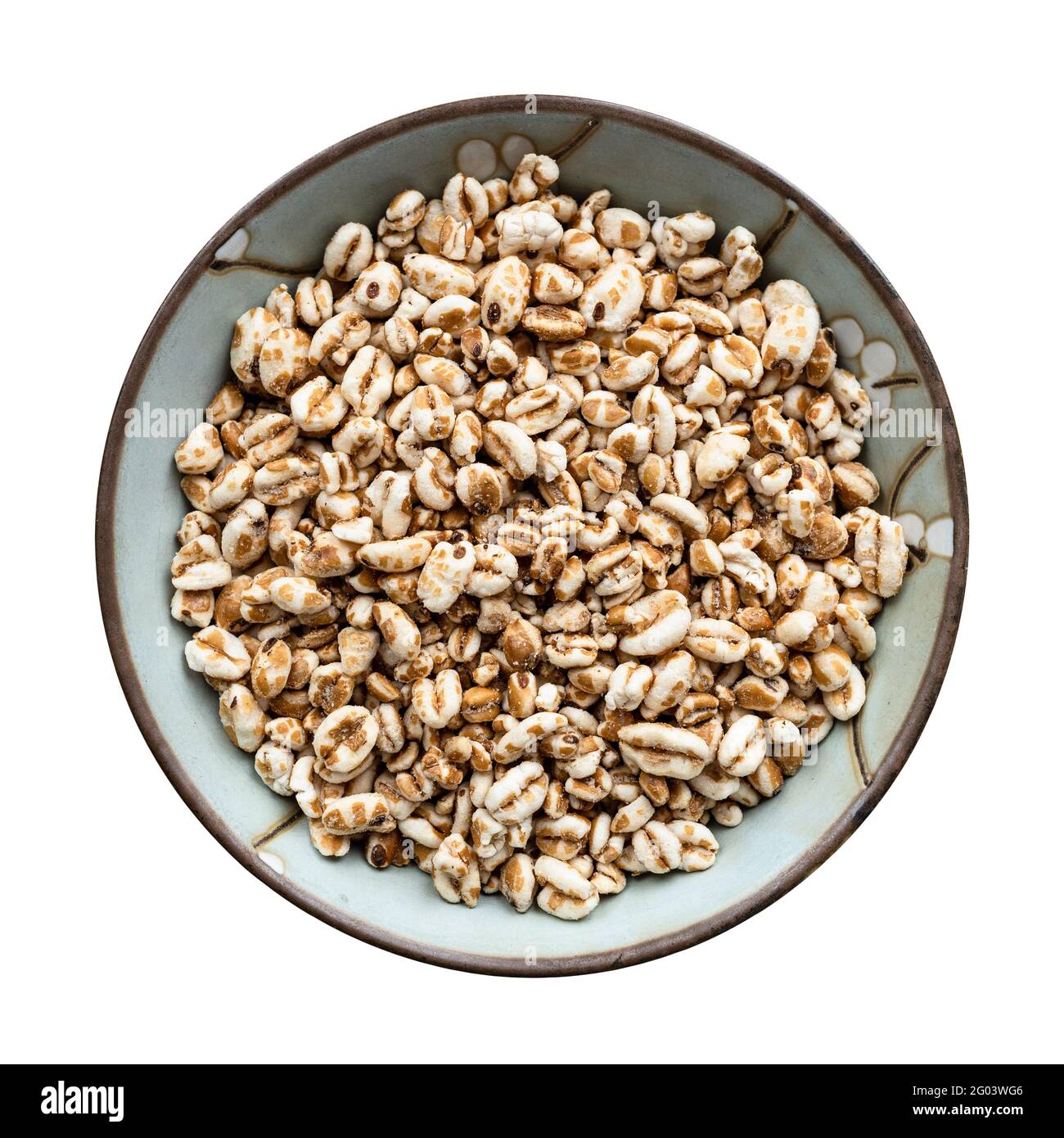 top view of puffed emmer farro wheat grains with cane sugar in ceramic ...