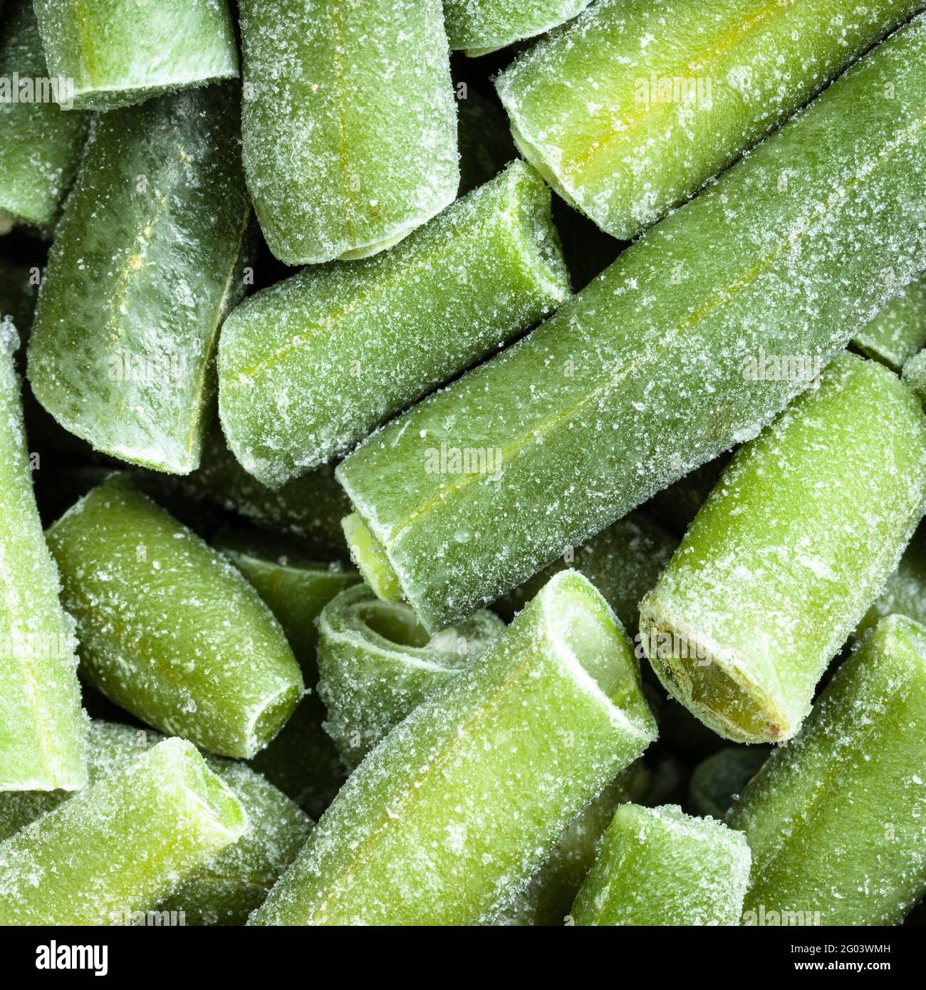 square food background - cut and frozen green beans close up Stock ...