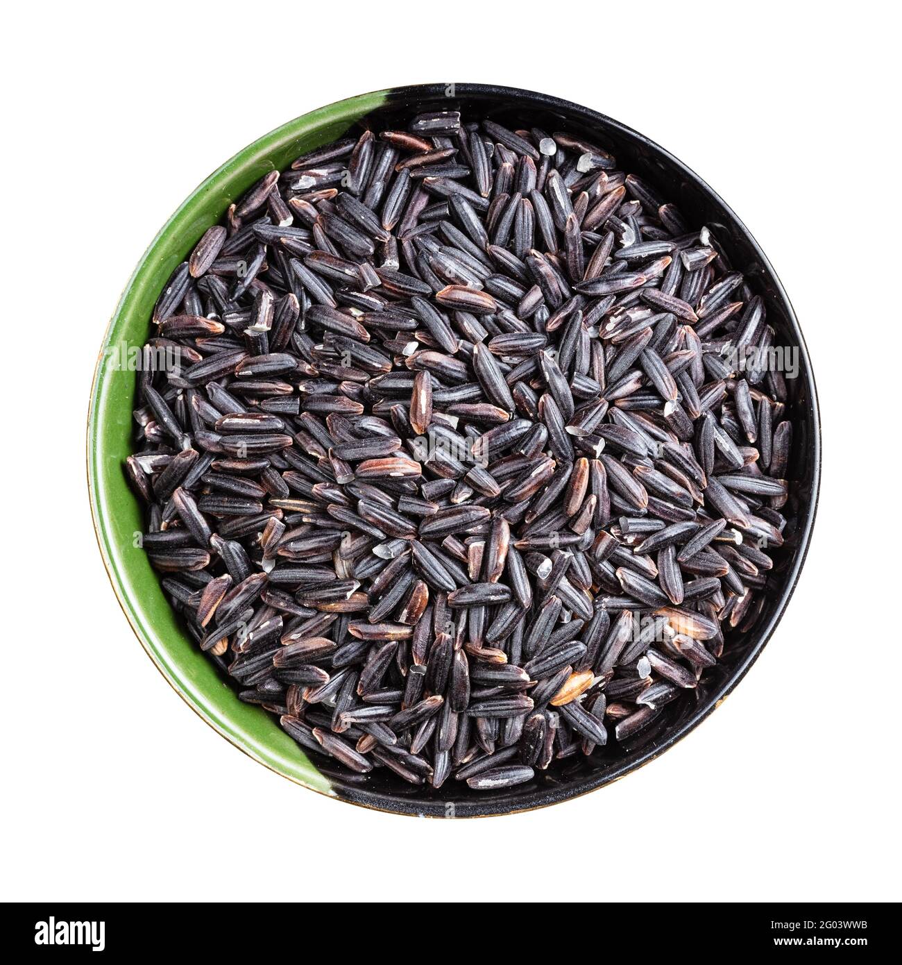 top view of raw black rice in round bowl isolated on white background ...