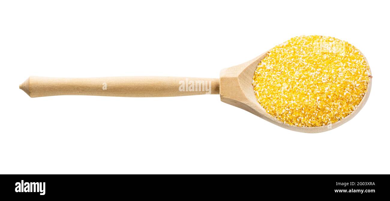 wooden spoon with uncooked coarse maize cornmeal isolated on white ...