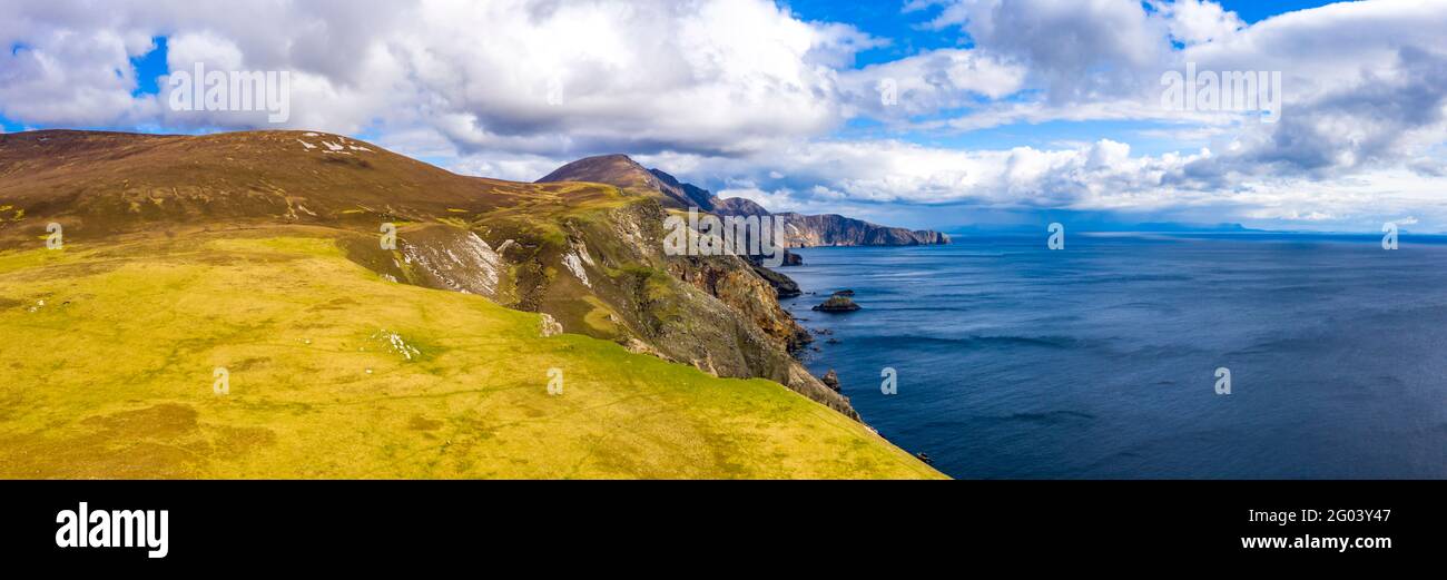 Aerial view of the beautiful coast at Malin Beg with Slieve League in ...