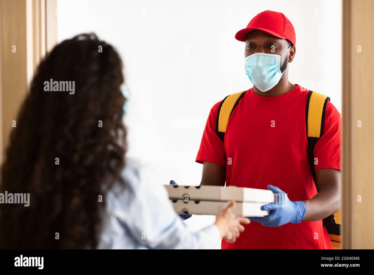 Delivery man mask package hi-res stock photography and images - Alamy