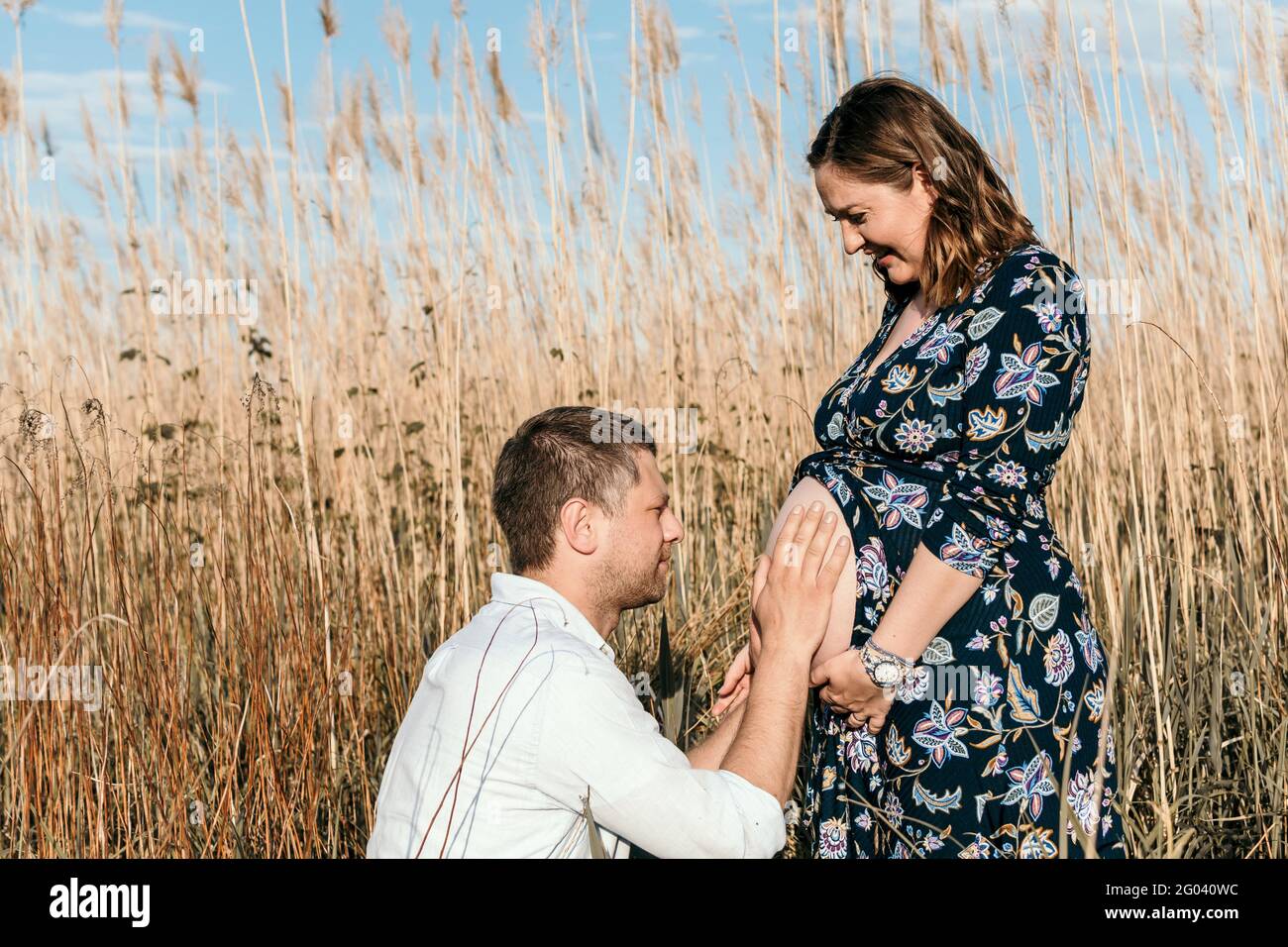 Beautiful young mother father hi-res stock photography and images - Alamy