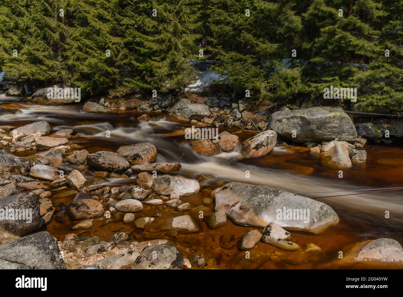 Color Jizera river near confluence with Jizerka creek in spring winter ...