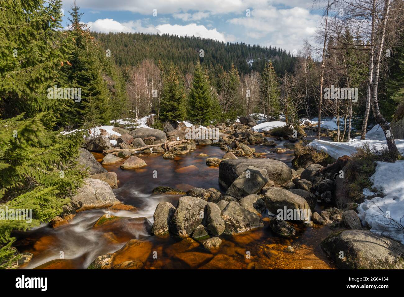 Color Jizerka river near confluence with Jizera creek in spring winter ...