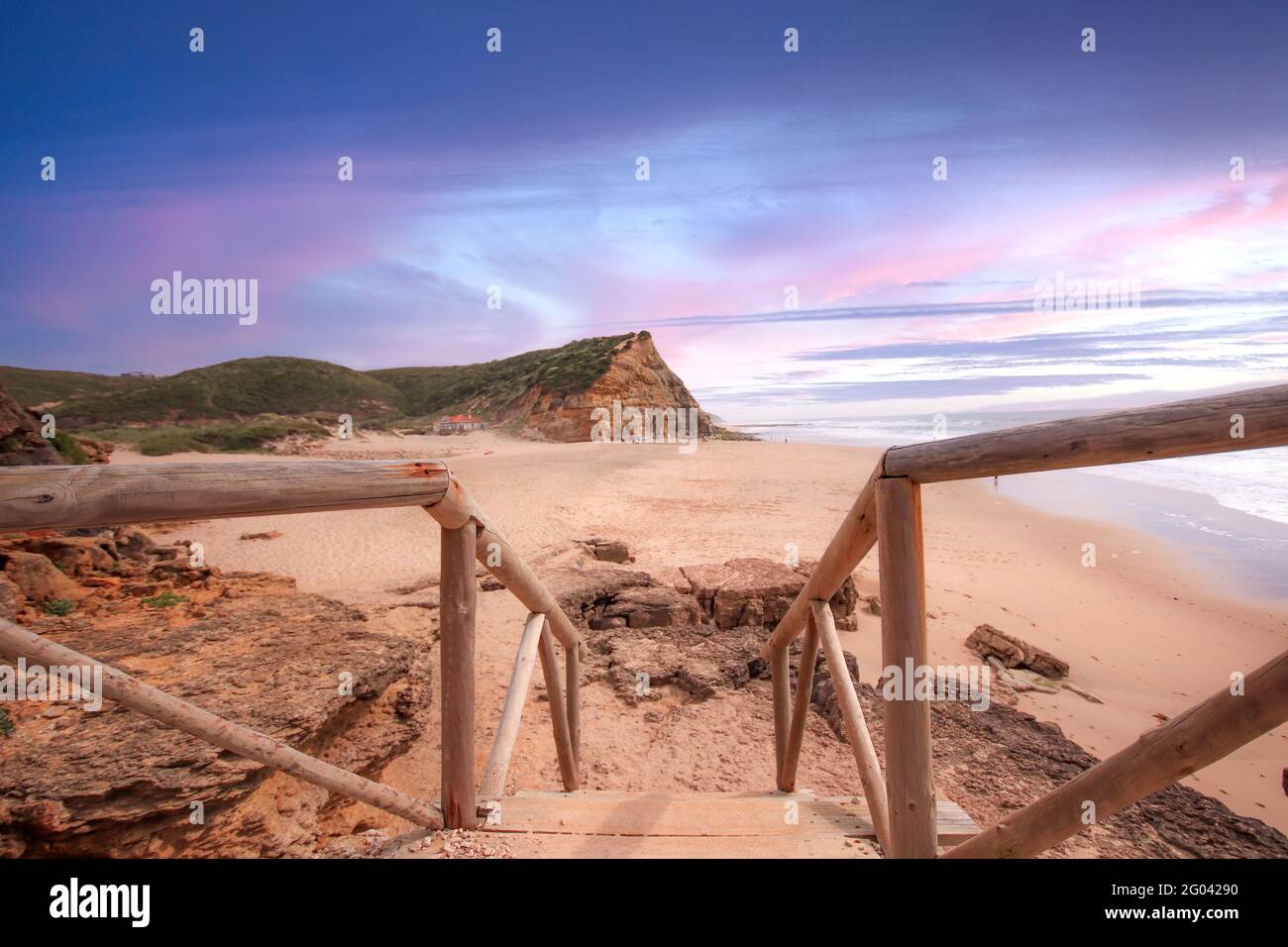 Beautiful sandy ocean beach and cliff at the sunset. Panorama atlantic ...