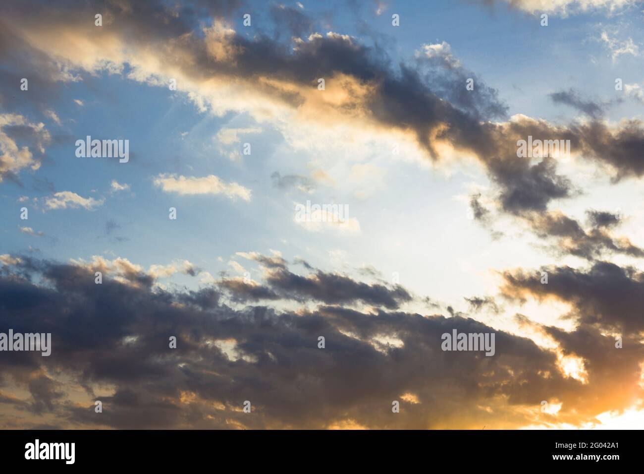 Evening sunset, sky above the clouds with dramatic yellow light Stock ...