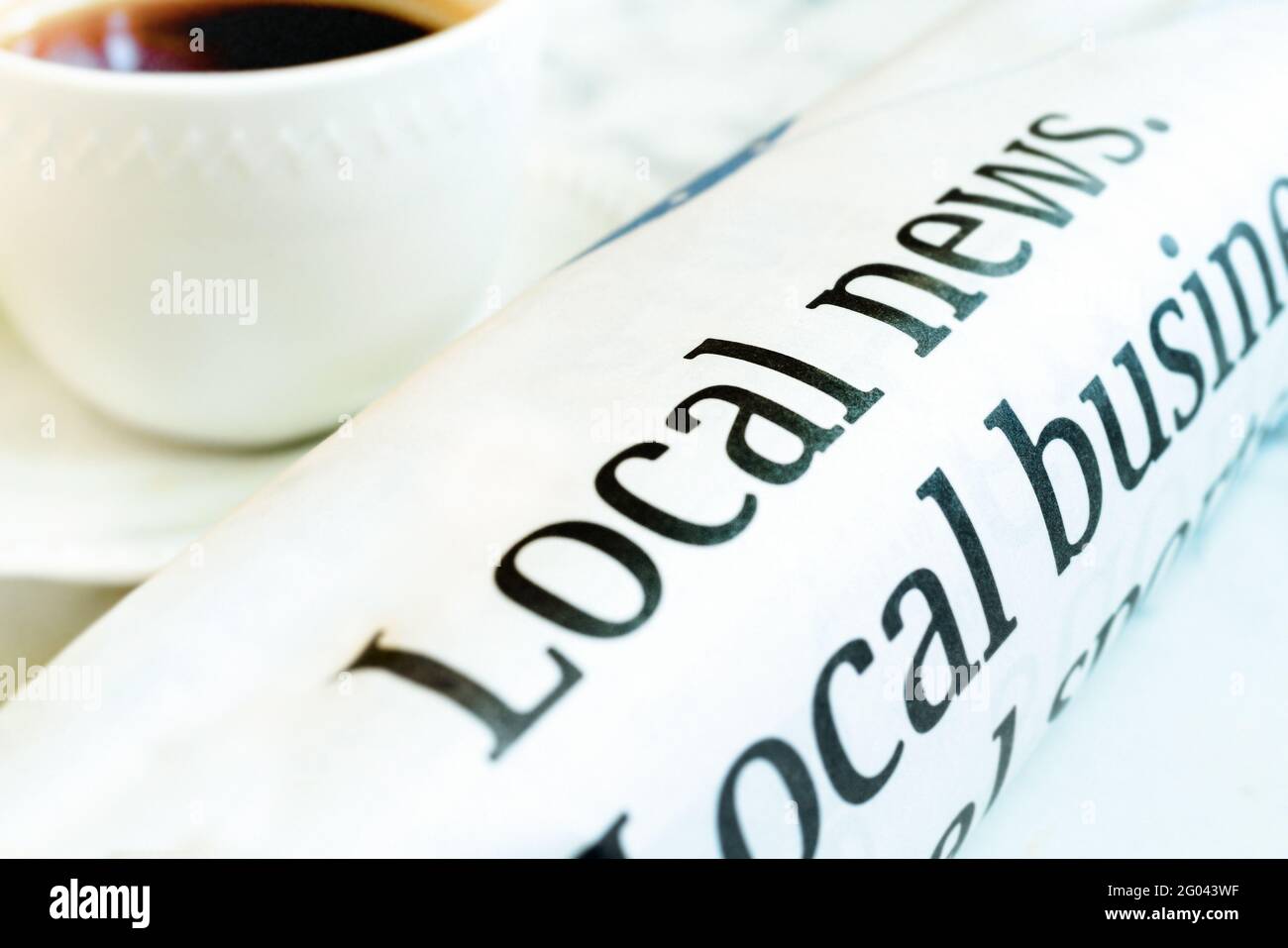 Rolled up newspaper hi-res stock photography and images - Alamy