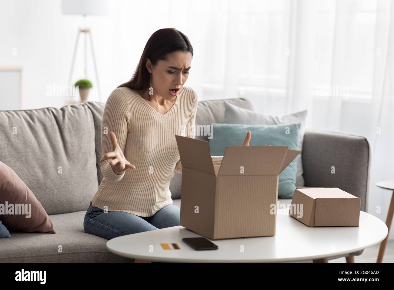 Wrong or broken online store order, bad delivery service, displeased by ...