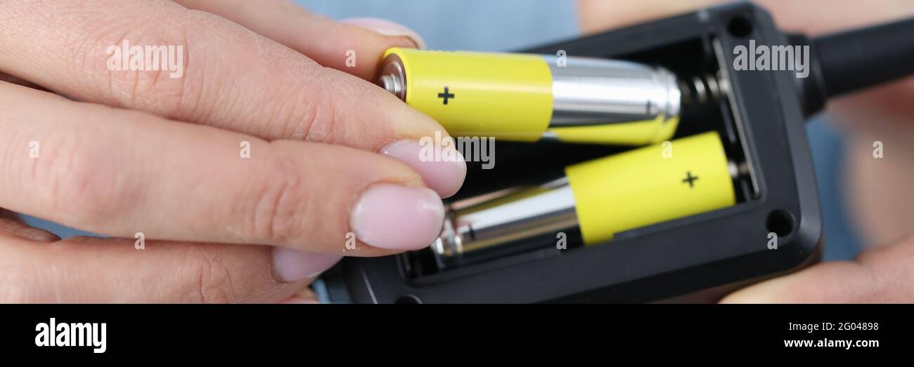 Inserting batteries hi-res stock photography and images - Alamy