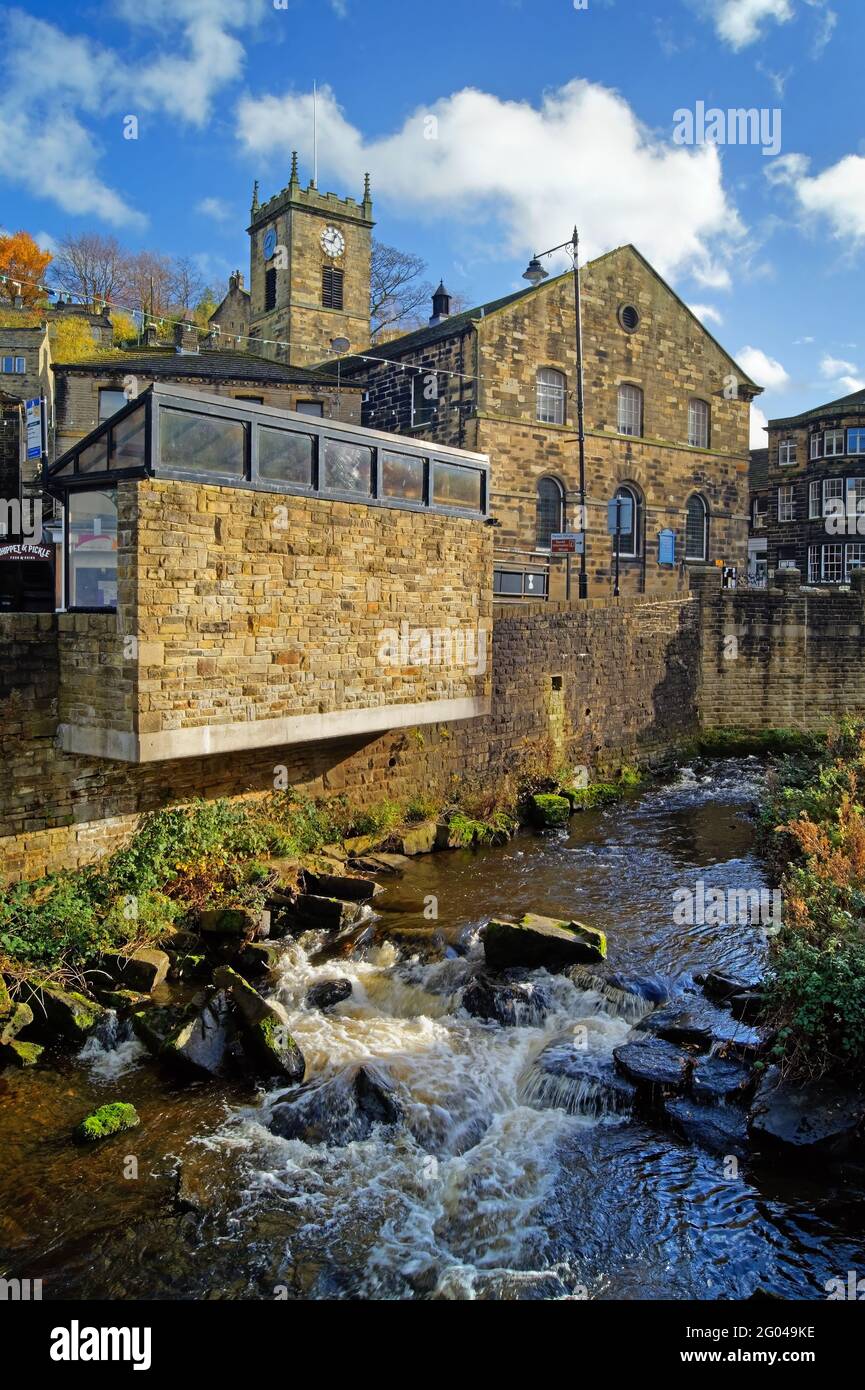 UK, West Yorkshire, Holmfirth, River Holme passing through town centre ...