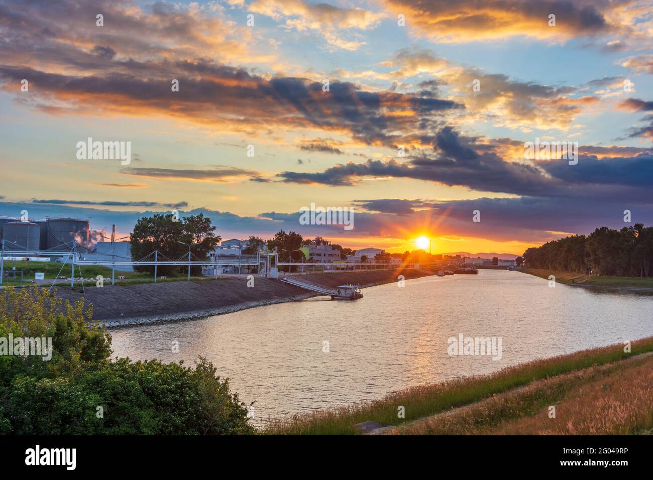 Wien, Vienna: port Ölhafen Lobau, oil storage tanks, cargo ship in 22 ...