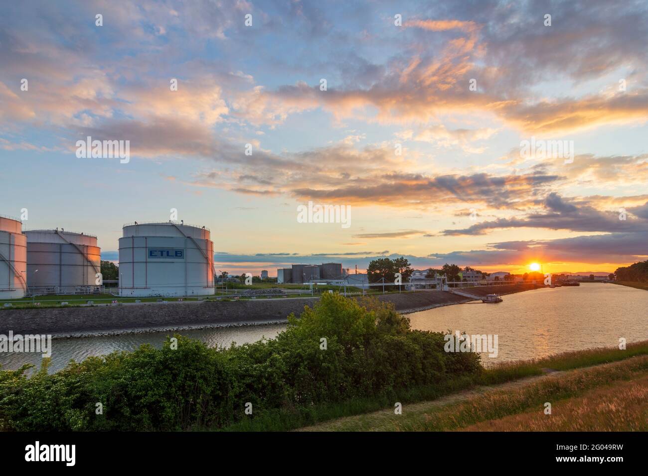 Wien, Vienna: port Ölhafen Lobau, oil storage tanks, cargo ship in 22 ...