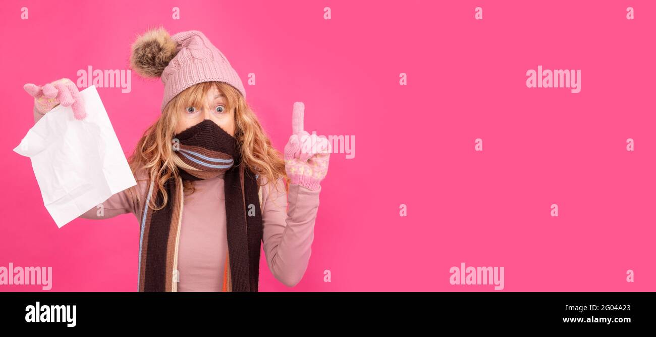 snug woman warm with scarf and kerchief isolated Stock Photo - Alamy