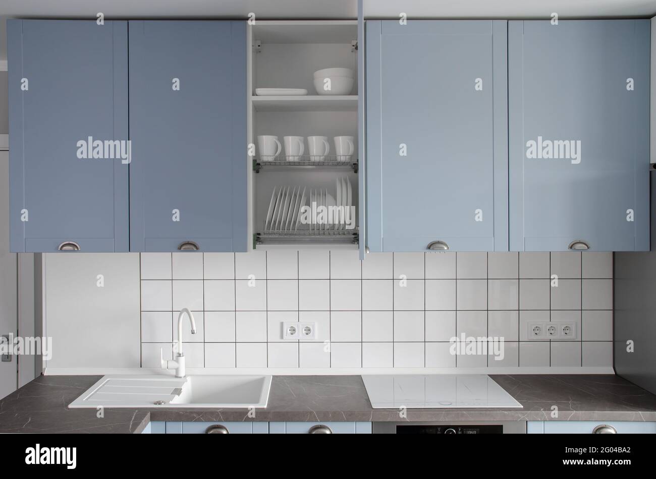 Modern clean minimalist kitchen with open cabinet and utensils Stock ...