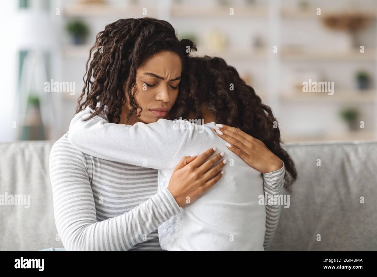 Two Sad Girls Hugging