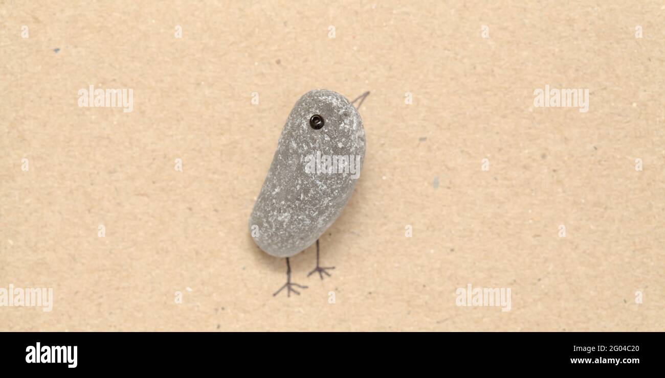 stylish textured craft paper background funny little bird made of a ...