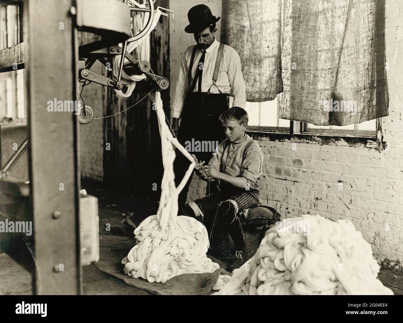 Child Labour: A boy working at the warping machine at Catawba Cotton ...