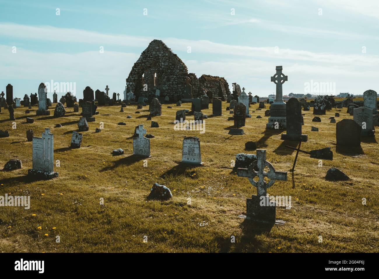 Large cemetery with gravestones on a sunny meadow Stock Photo - Alamy