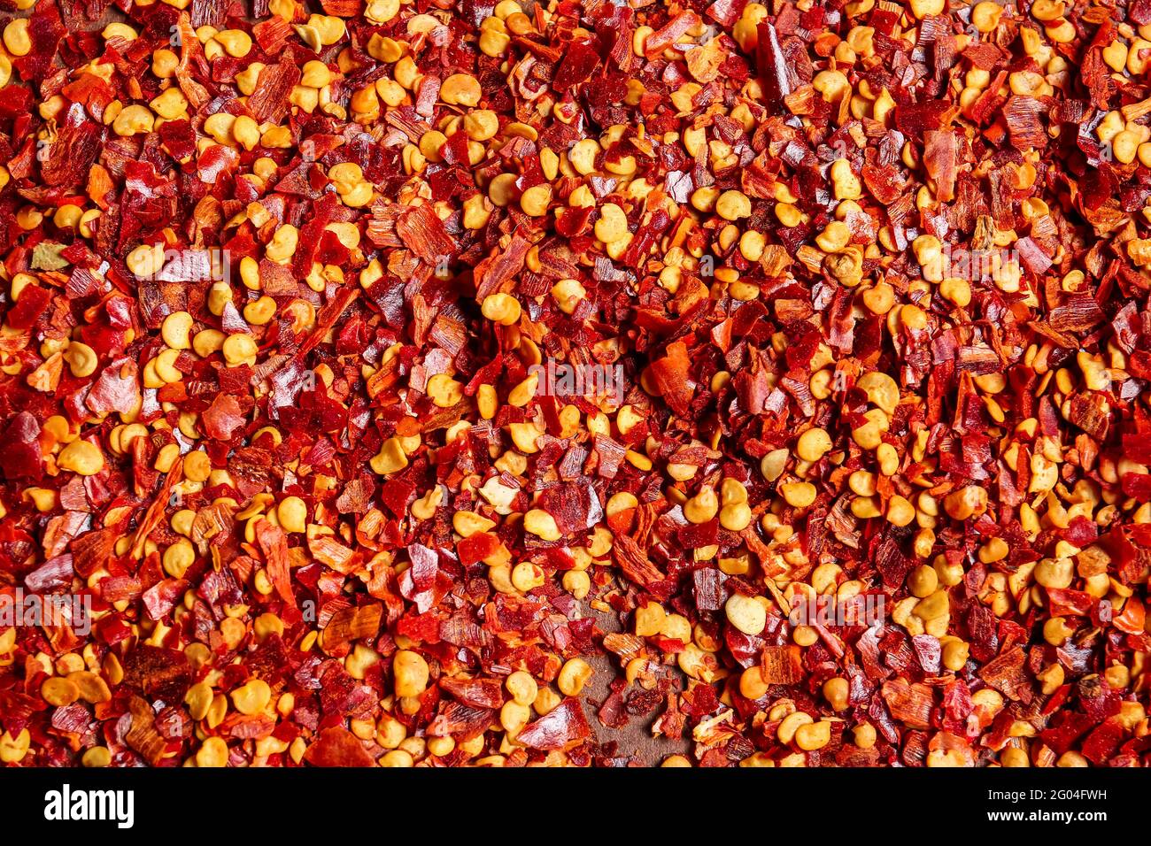 Hot ground chili pepper as background Stock Photo - Alamy