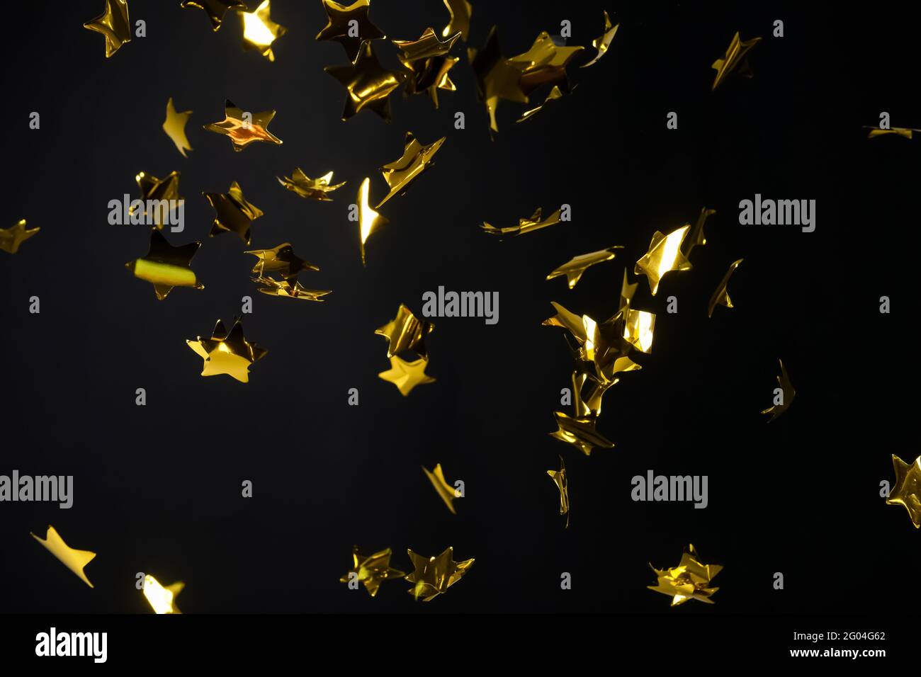 Confetti falling on dark hi-res stock photography and images - Alamy