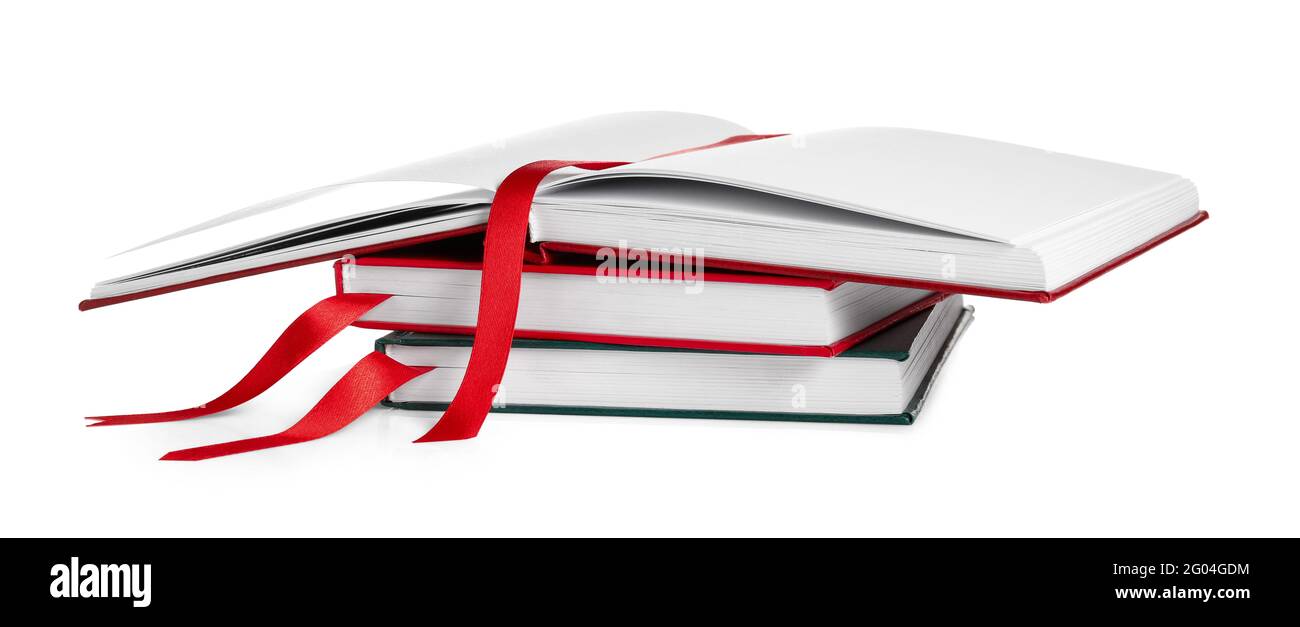 Books with bookmarks on white background Stock Photo - Alamy