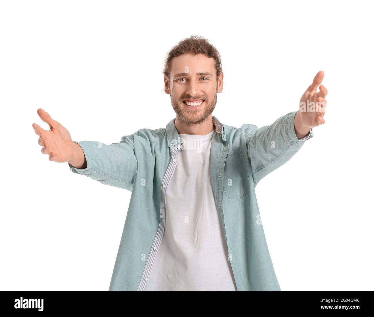 Young man opening arms for hug on white background Stock Photo - Alamy