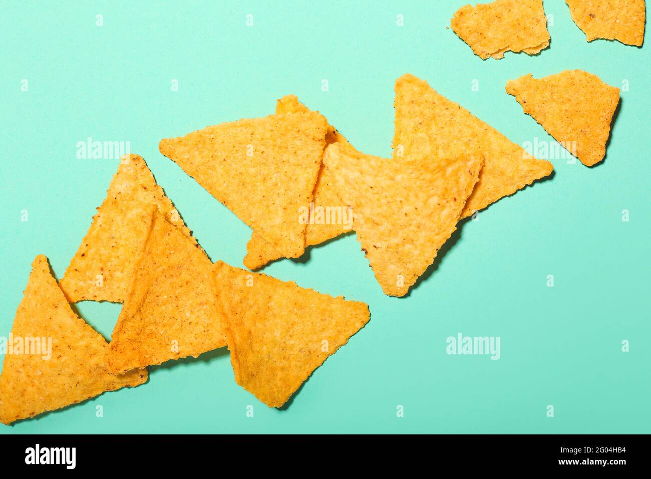 Tasty nachos on color background Stock Photo - Alamy