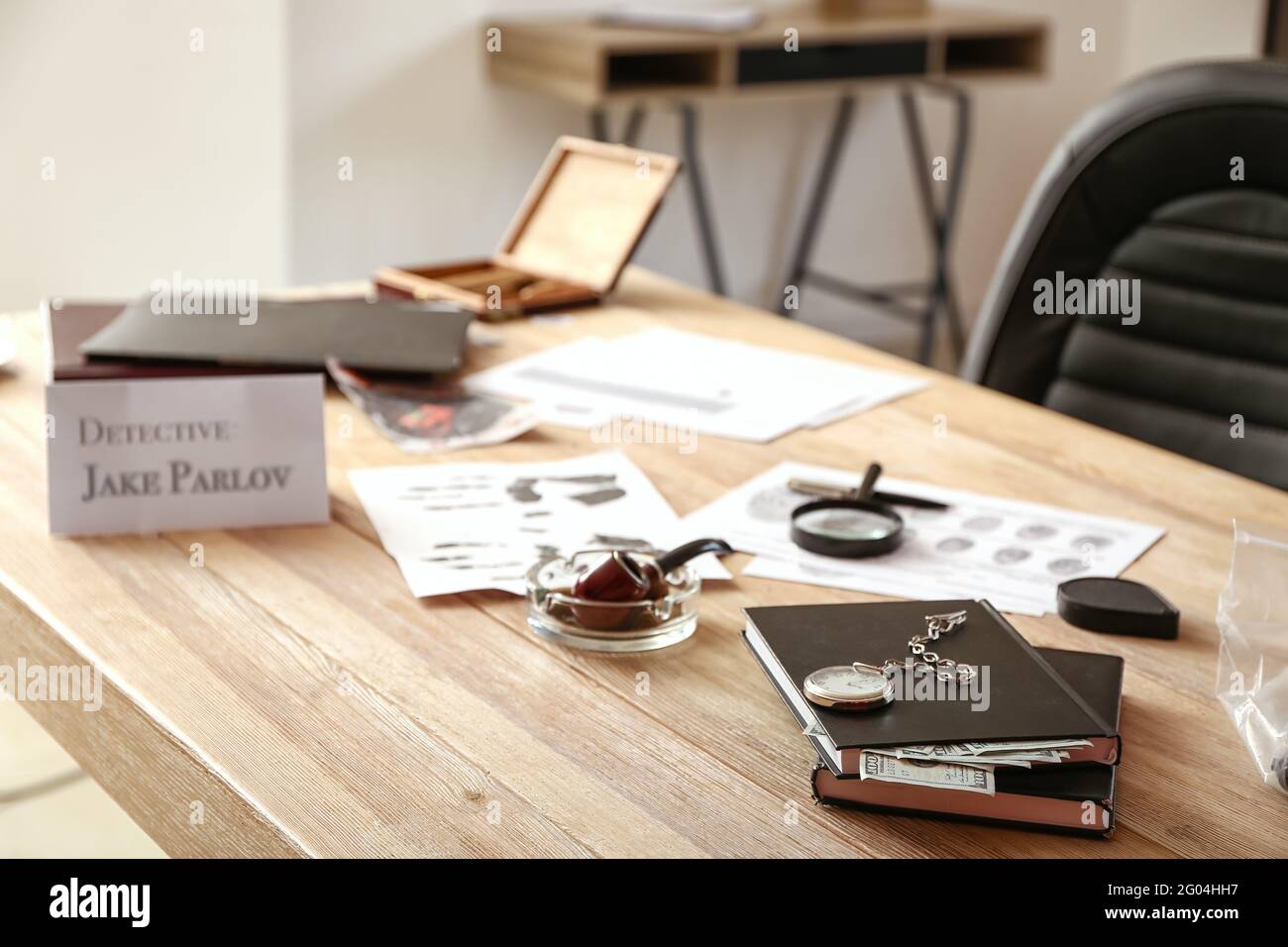 Workplace of detective in police department Stock Photo - Alamy