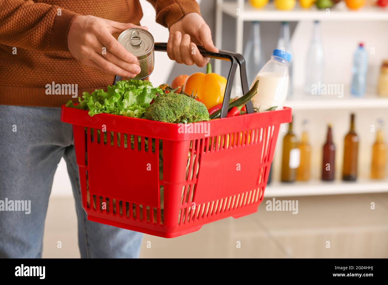 Man buying food in supermarket Stock Photo - Alamy