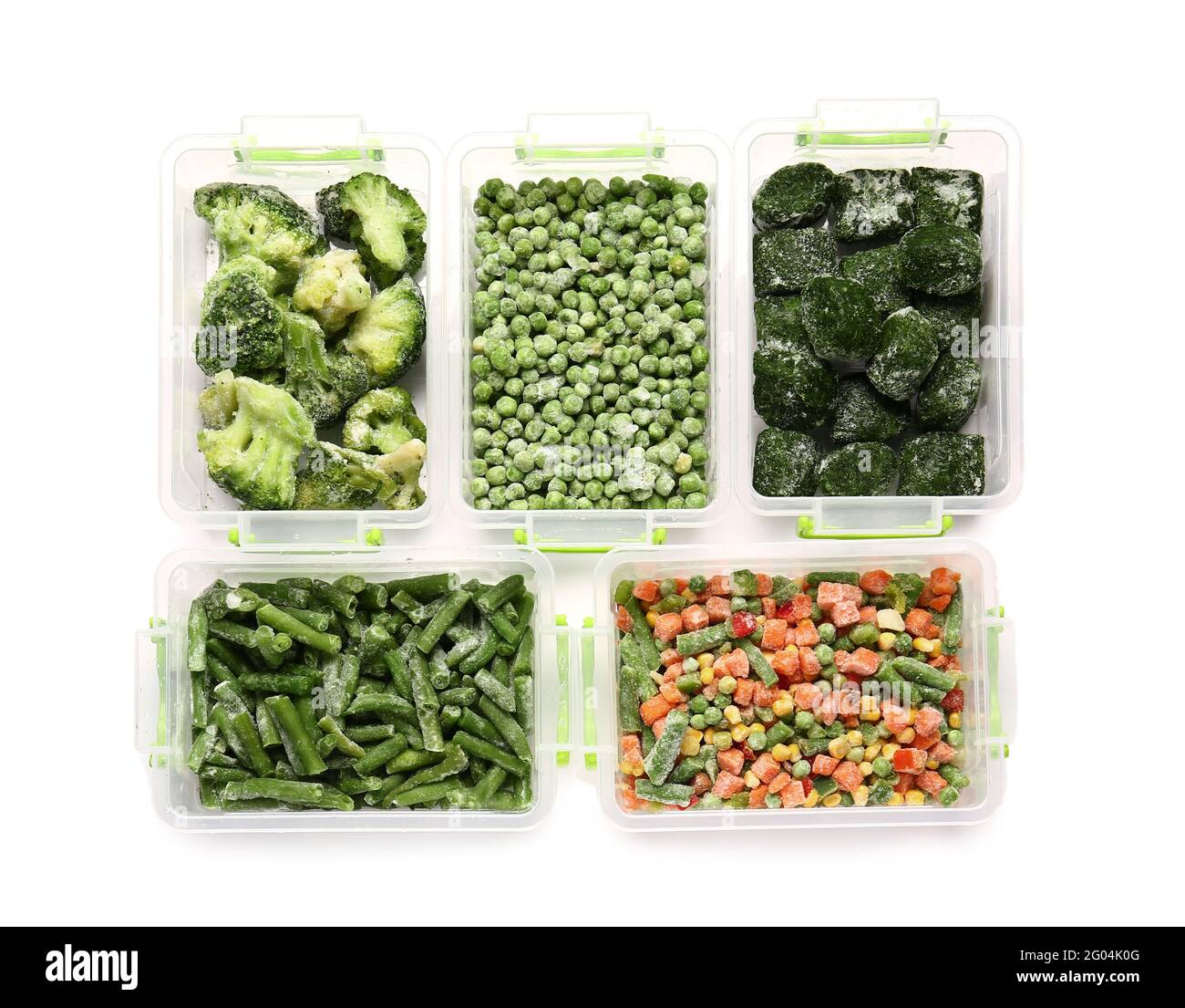 Plastic containers with frozen vegetables on white background Stock ...