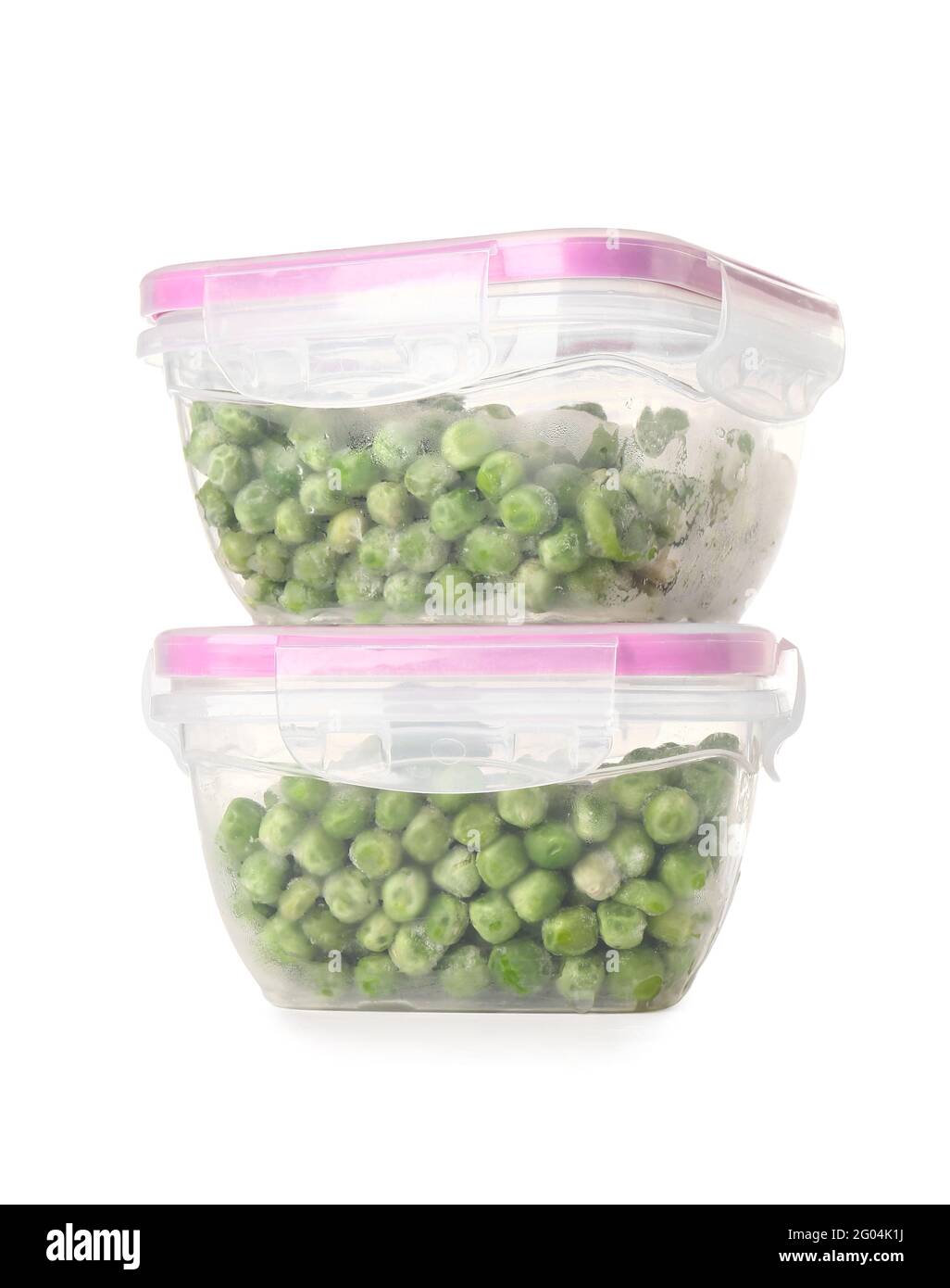 Plastic containers with frozen green peas on white background Stock ...