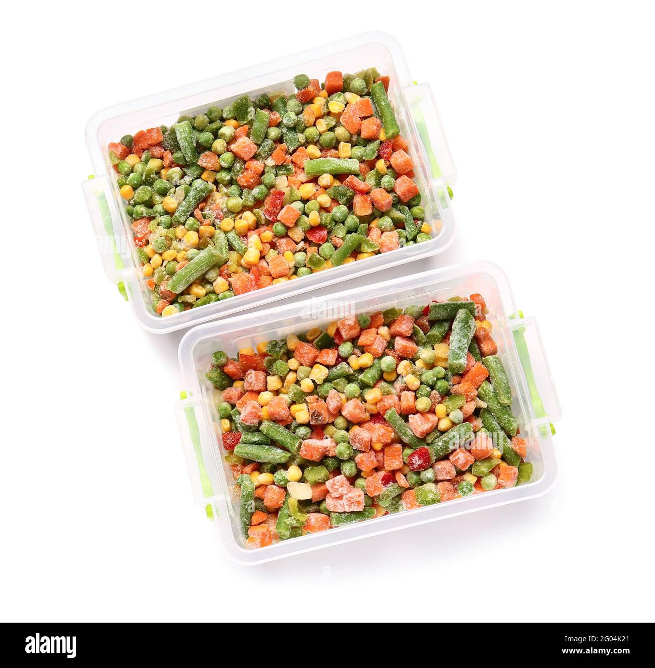 Plastic containers with frozen vegetables on white background Stock ...